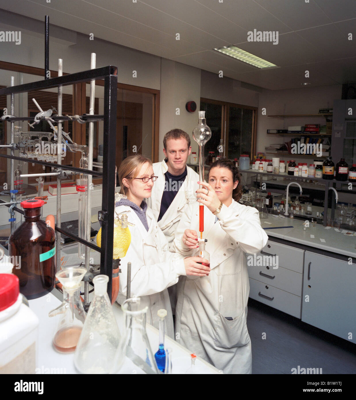 pharmacy students in laboratory experiment Stock Photo - Alamy