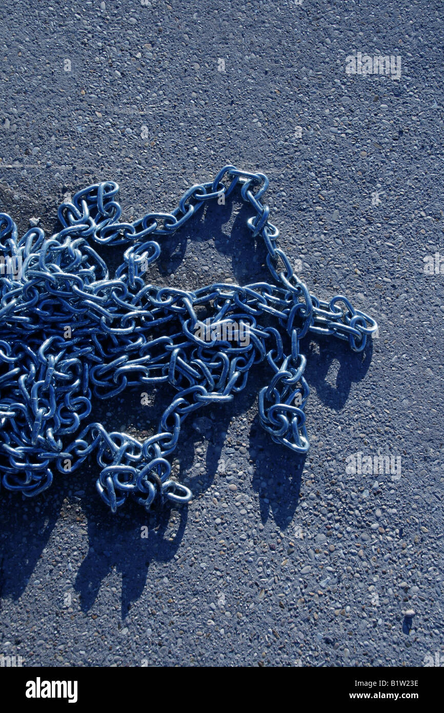 detail of metal chain on floor outdoors Stock Photo - Alamy