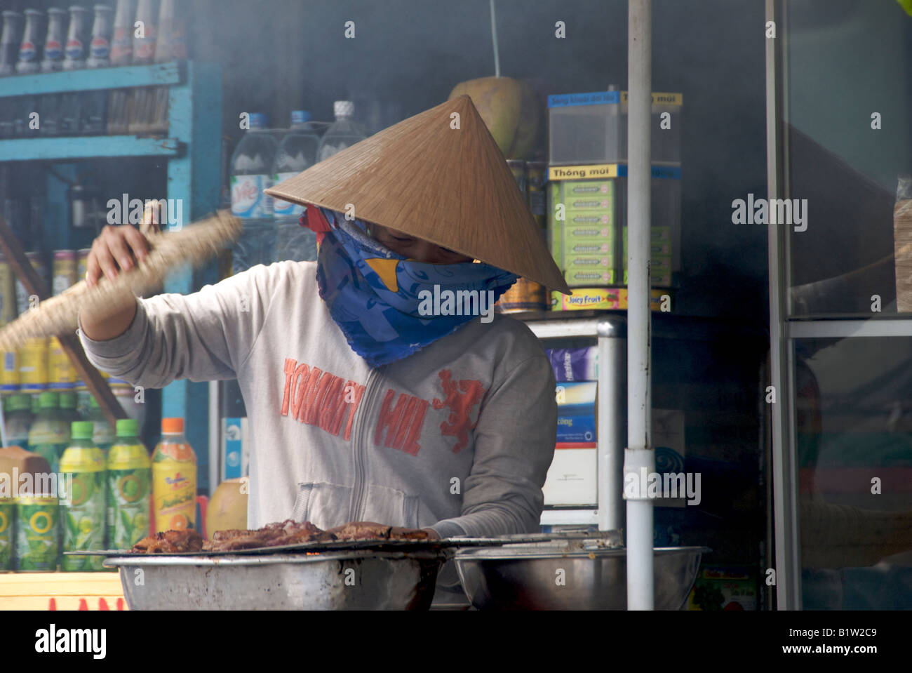 Woman cooking barbeque meats Vinh Long Mekong Delta Vietnam Stock Photo ...
