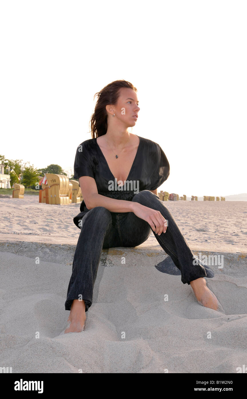 young woman 24 posing at beach, backlight chillout backlight brunette ...