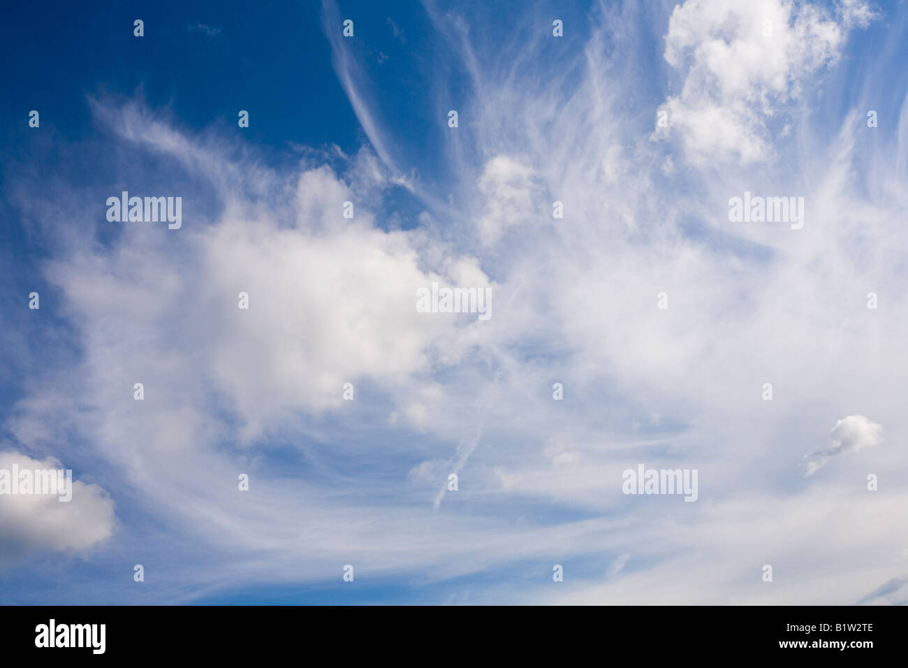 High level Cirrus clouds in early English summer Stock Photo - Alamy