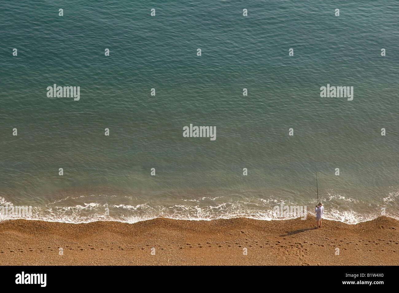 Angler from above, Seatown, Dorset, England, United Kingdom, Europe ...
