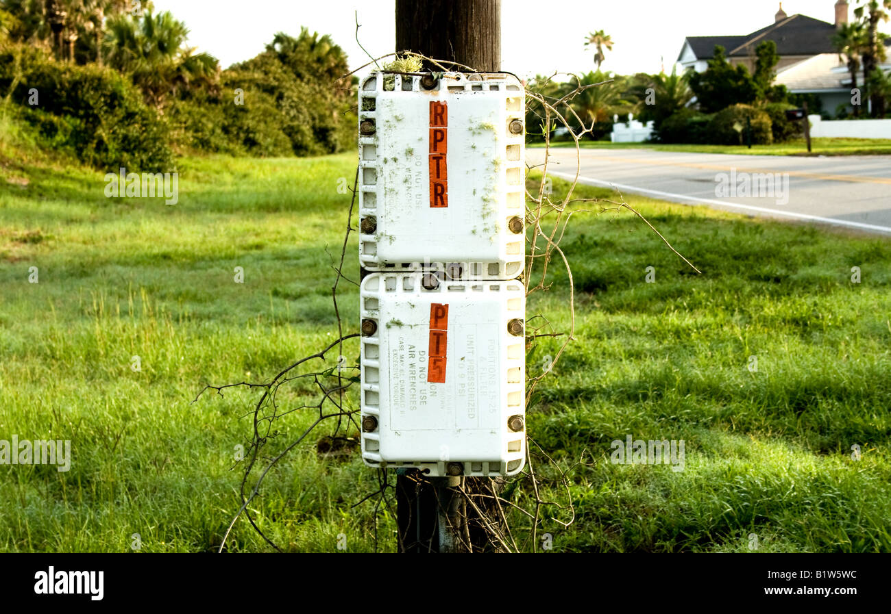Two power boxes on a telephone pole by the roadside in Ponte Vedra ...