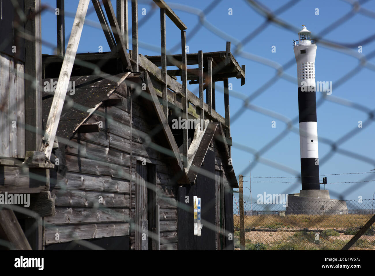 Desserted old shack, on a shingle beach on the south west coast of ...