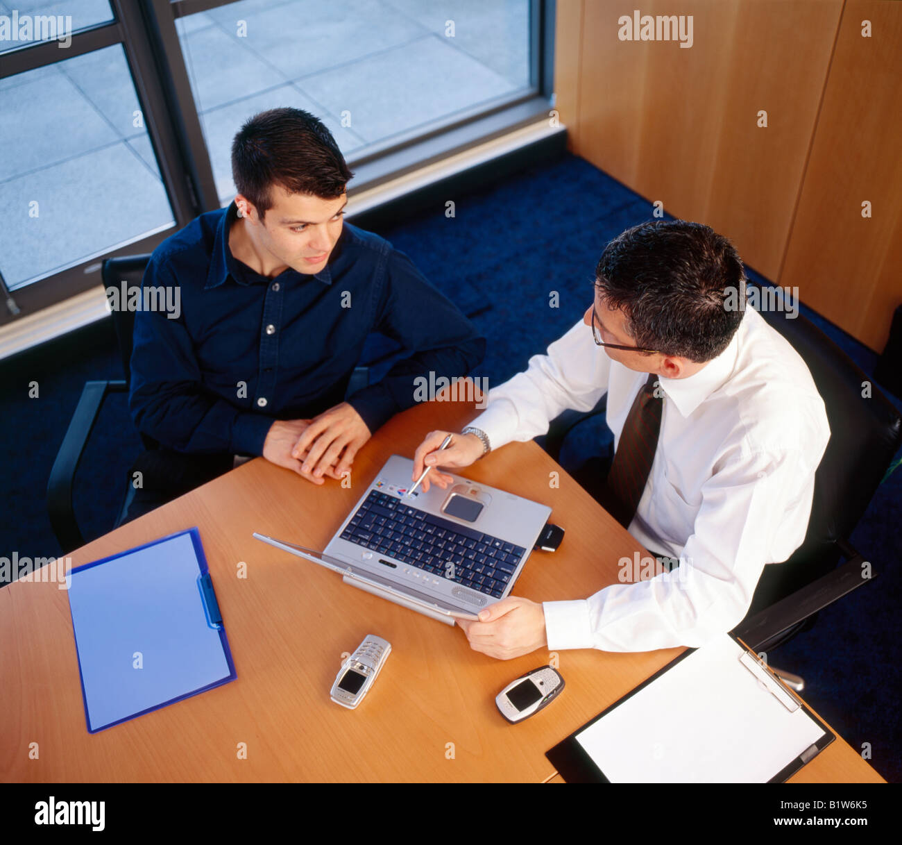 two men at business meeting Stock Photo - Alamy