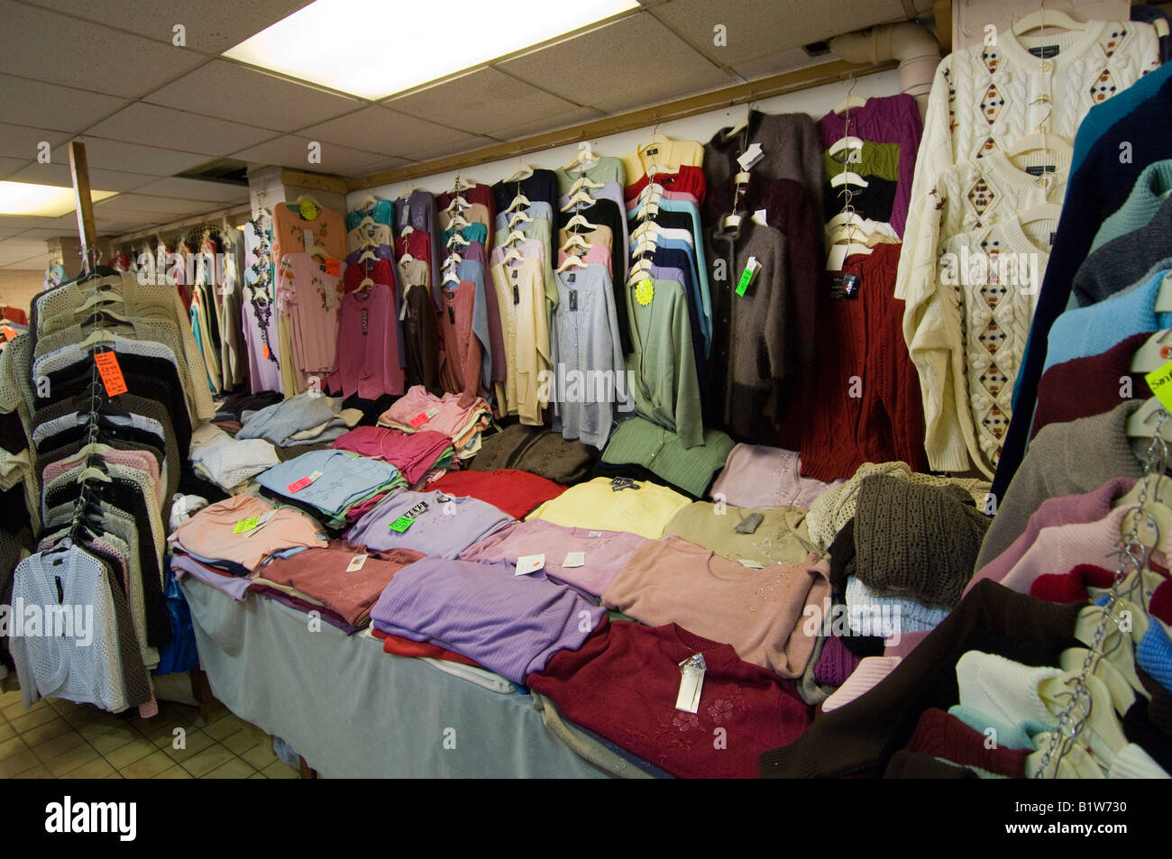 A knitwear stall in Fleetwood indoor Market, Lancashire, UK Stock Photo ...