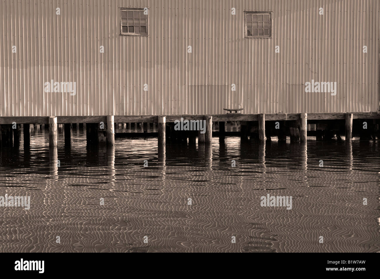 Old wooden wharf and warehouse Stock Photo - Alamy