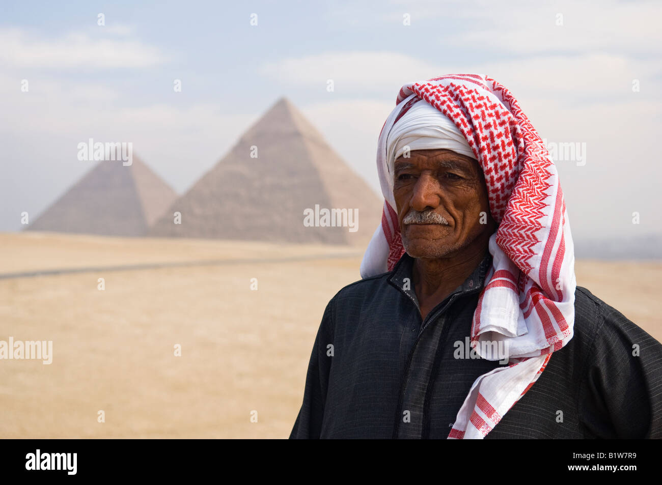 Portrait of old an Egyptian Man with the Great Pyramid of Khufu and ...
