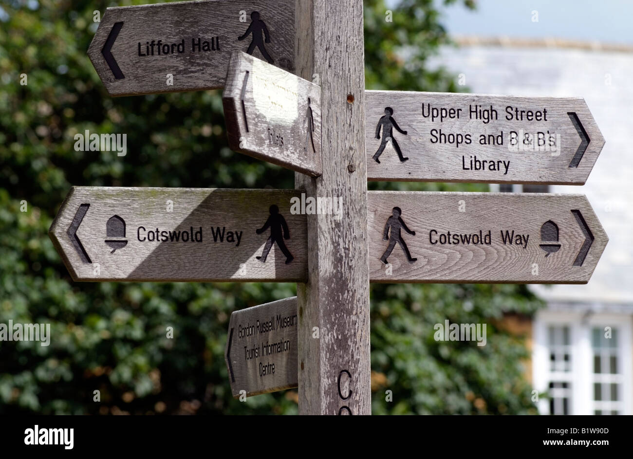 Wooden street directional signpost Cotswolds England UK Stock Photo - Alamy