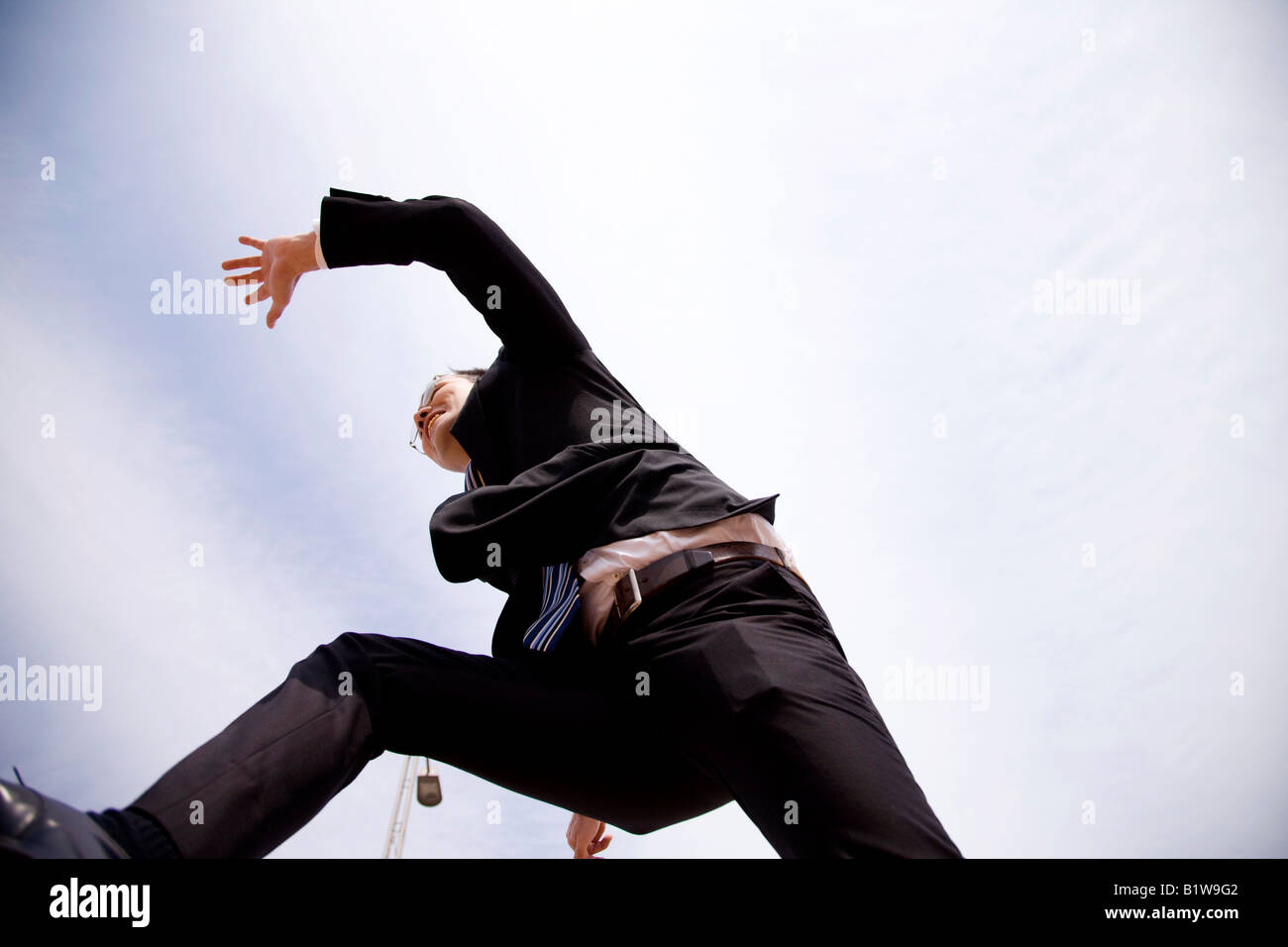 Japanese office worker jumping lively Stock Photo - Alamy