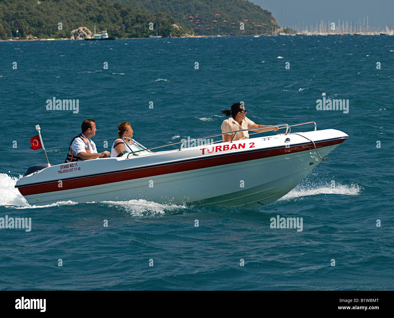SPEED BOAT LEAVES HARBOUR AT MARMARIS MUGLA TURKEY Stock Photo - Alamy