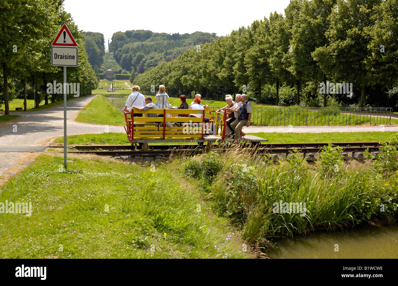 Group of people on a Grenzland Draisine traversing the Baroque Garden ...