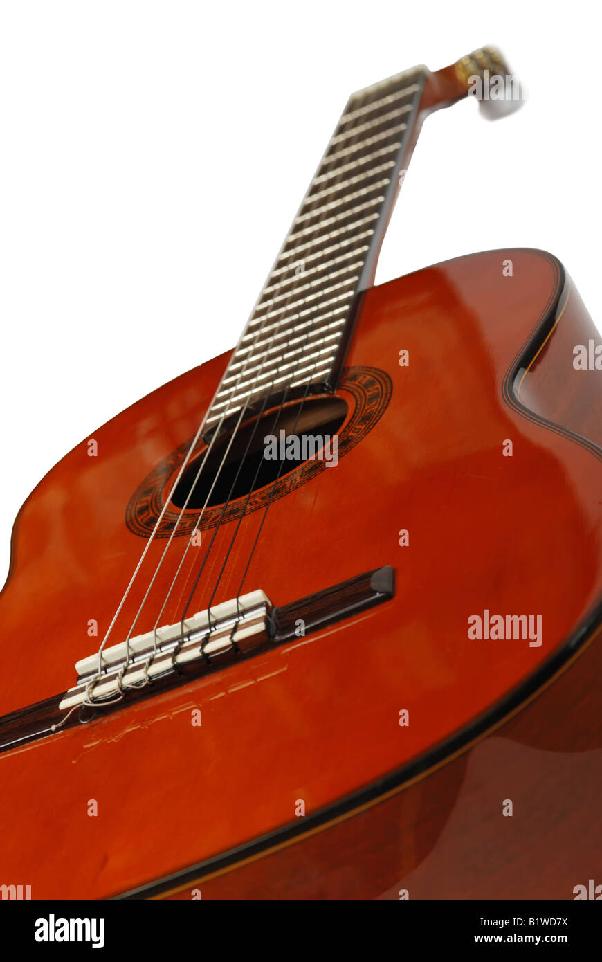Guitar An acoustic six string guitar isolated by a plot a background ...