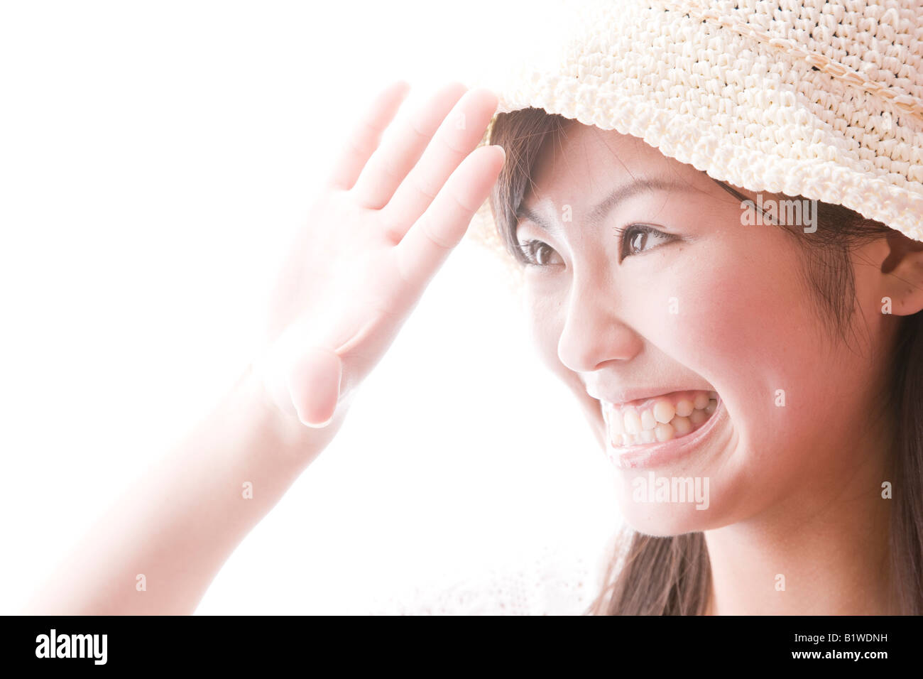 Young asian lady putting hi-res stock photography and images - Alamy