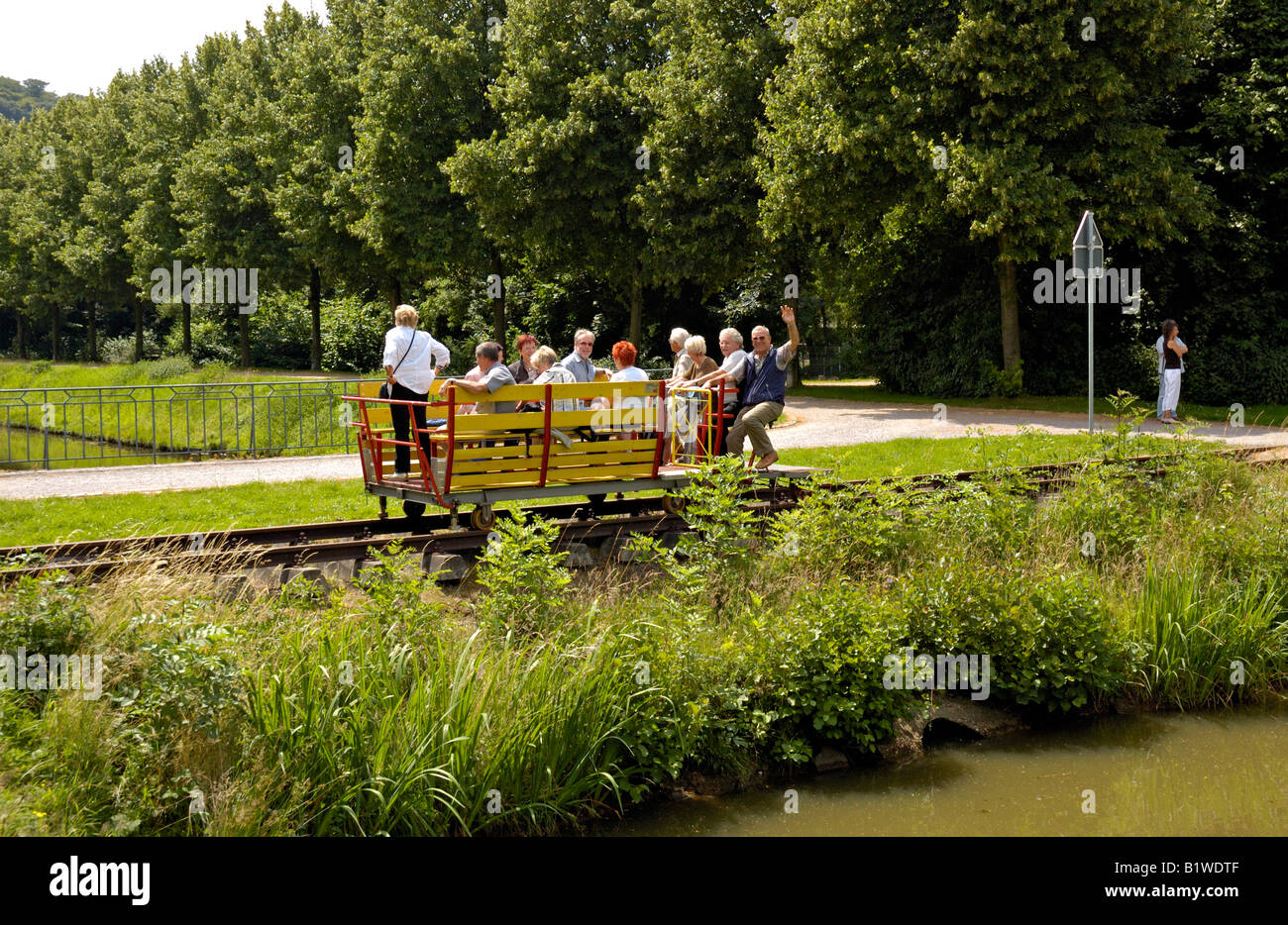 Group of people on a Grenzland Draisine traversing the Baroque Garden ...