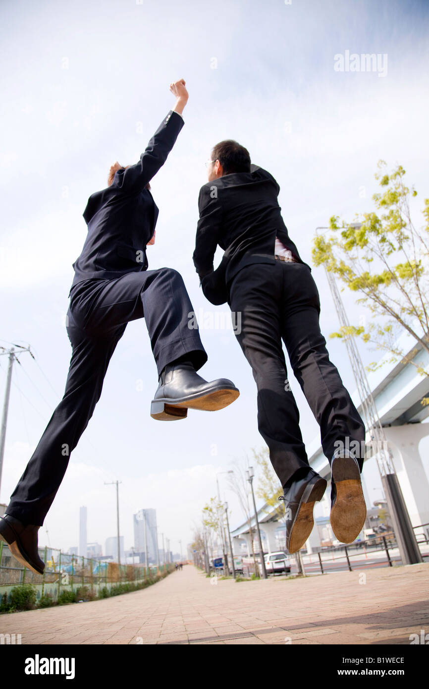 Japanese office workers jumping lively Stock Photo - Alamy