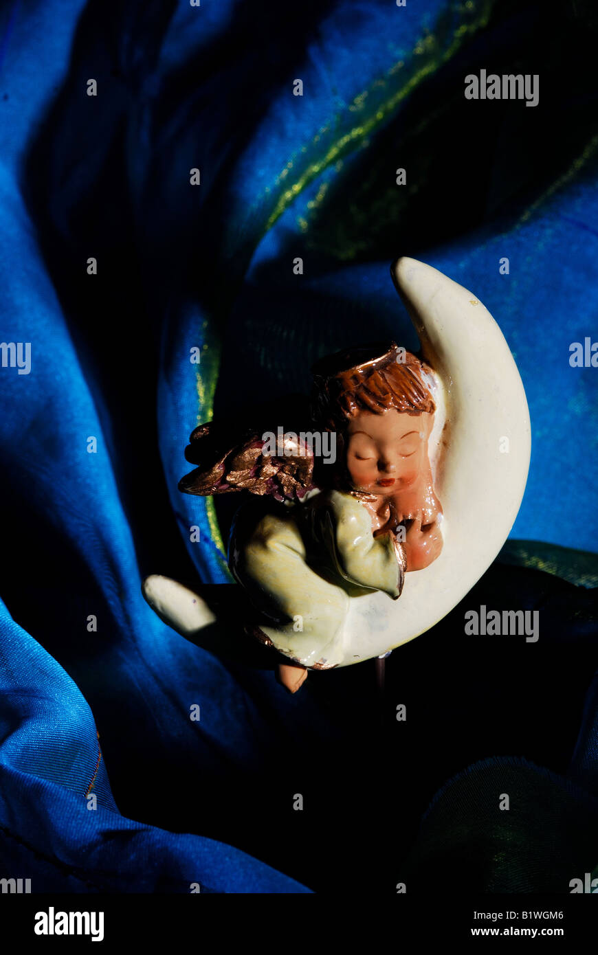 angel on the moon Stock Photo - Alamy