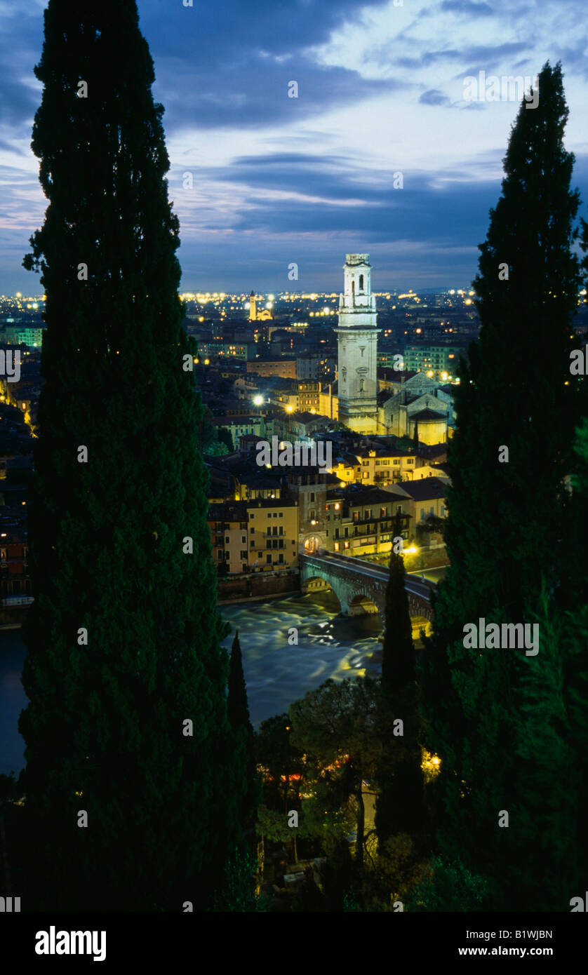 ITALY Veneto Verona Cityscape at night showing tiled rooftops, Duomo ...
