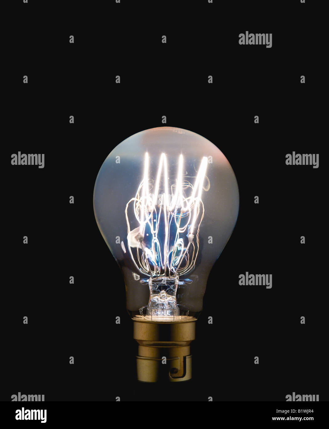 POWER Elecricity Light Electric light bulb showing lit element against ...