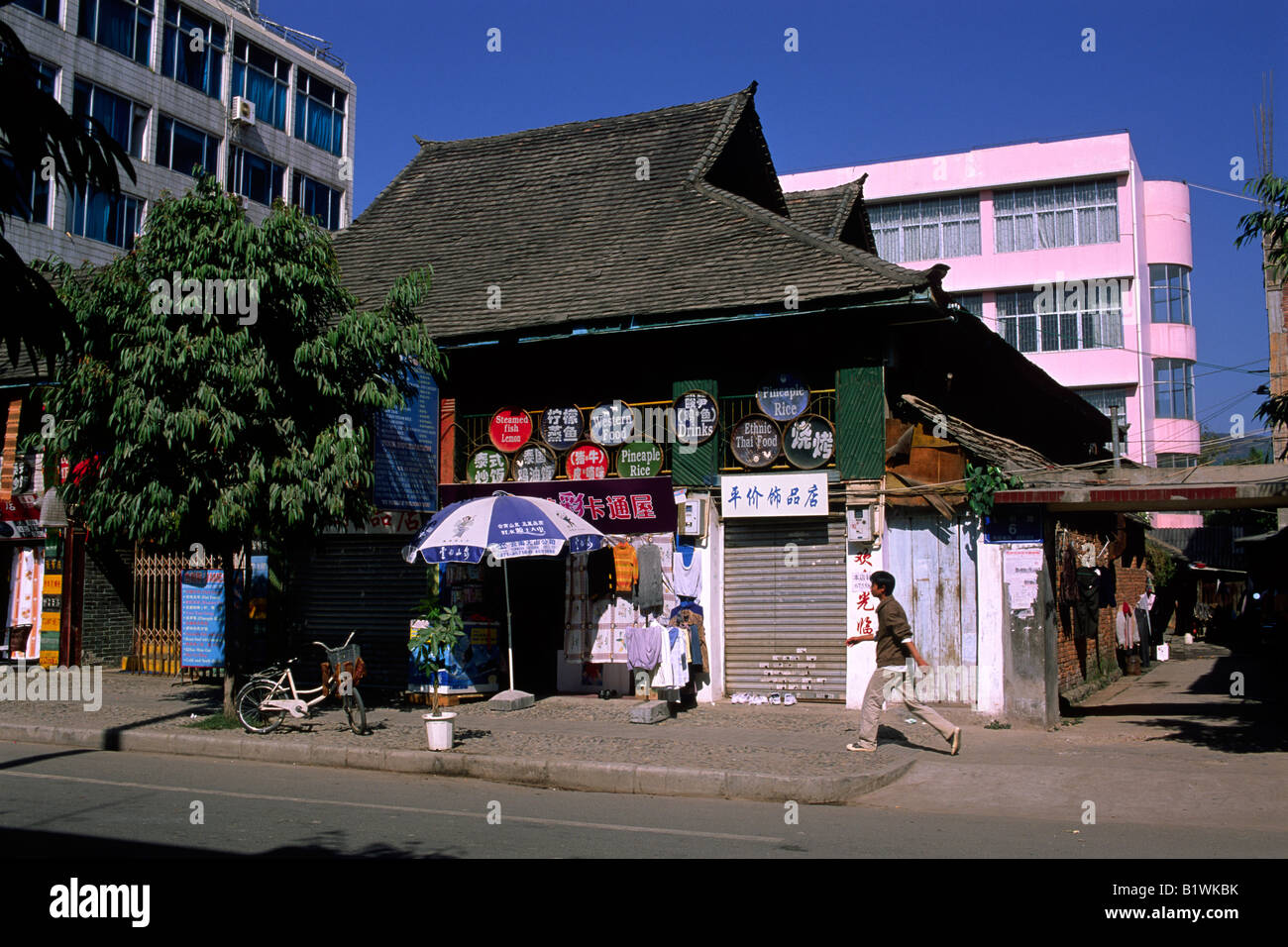 China, Yunnan, Xishuangbanna, Jinghong, Dai minority house Stock Photo ...