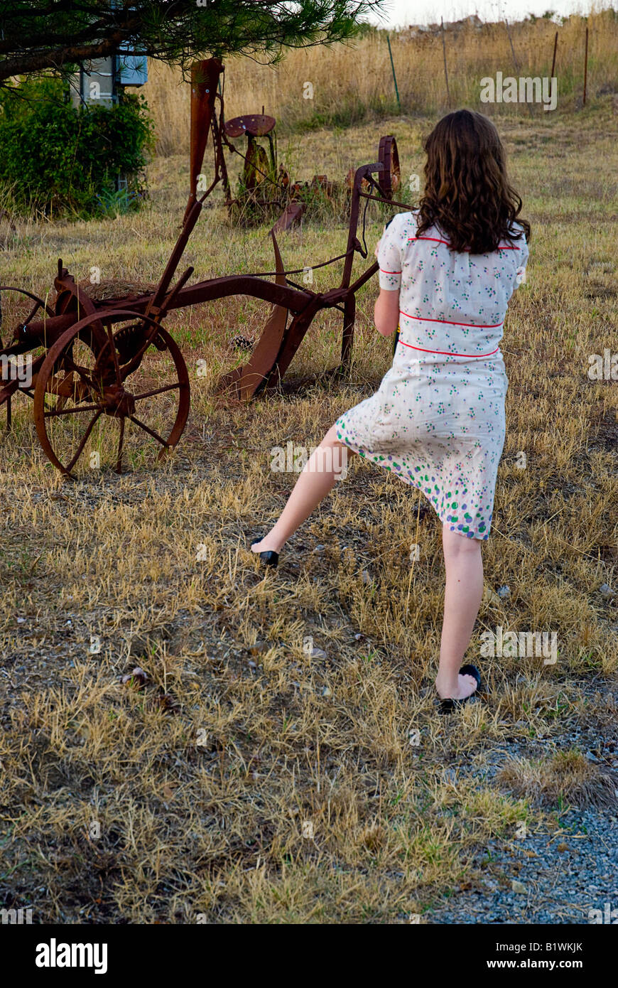 Young woman on a farm Stock Photo - Alamy
