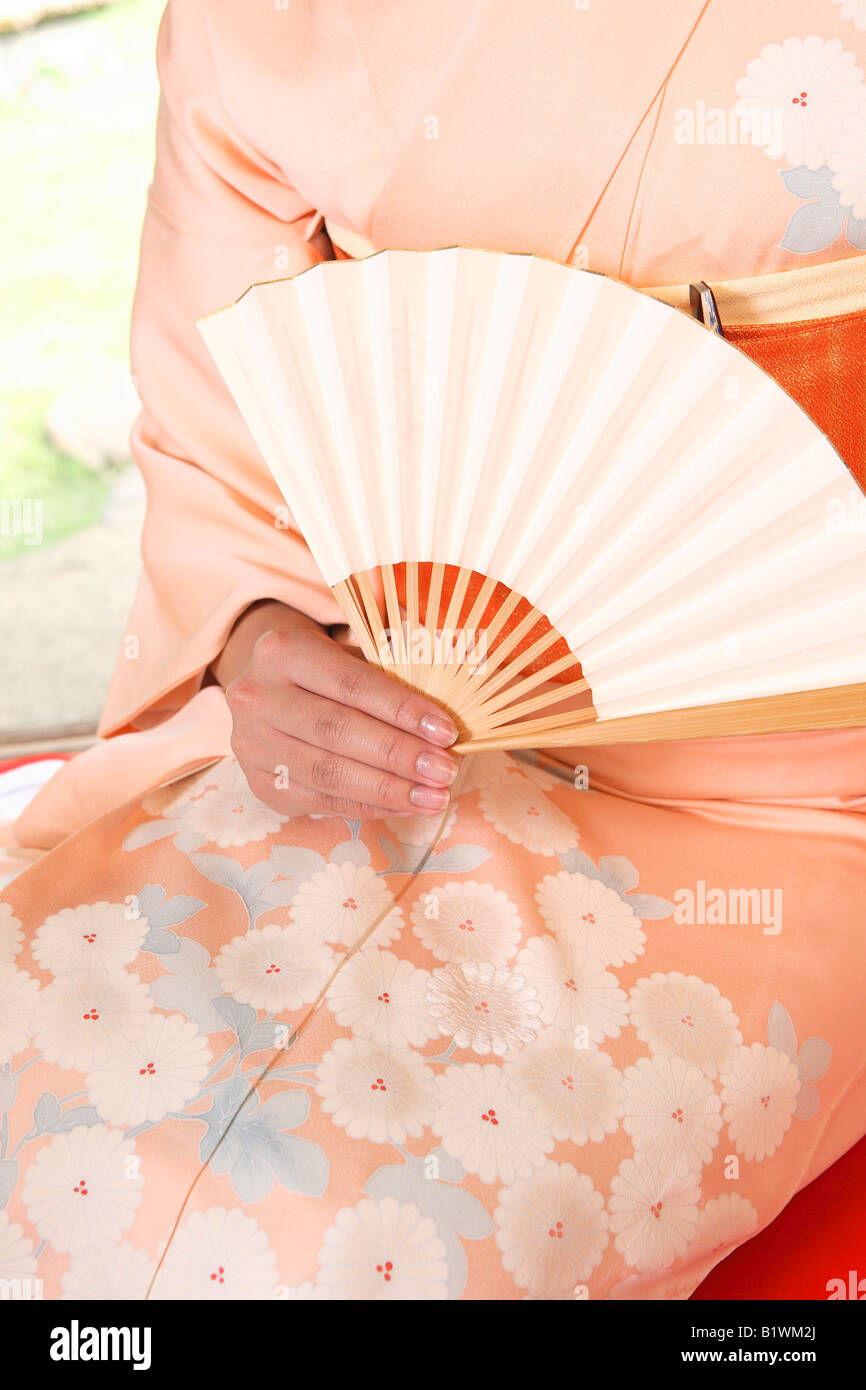 Hand having a fan Stock Photo - Alamy