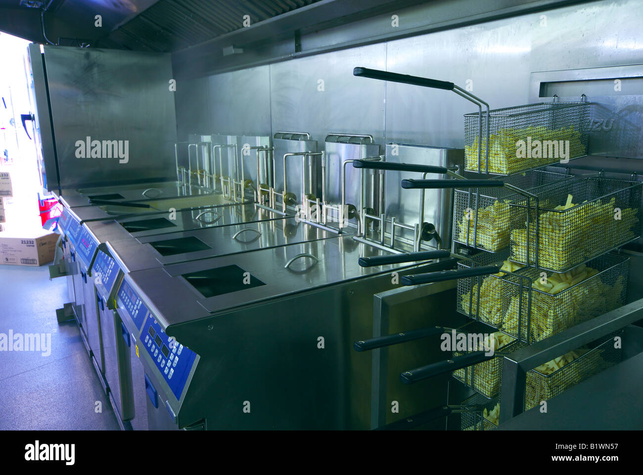 Row of Chip fryers Stock Photo - Alamy