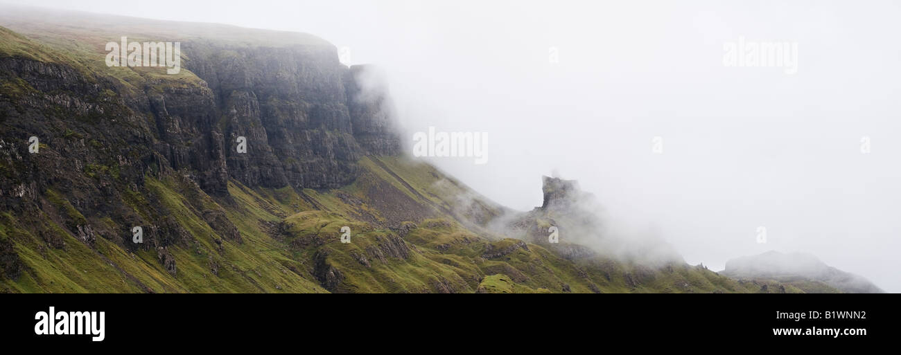 Thick clouds surround the rugged cliffs of the Quiraing, Isle of Skye ...