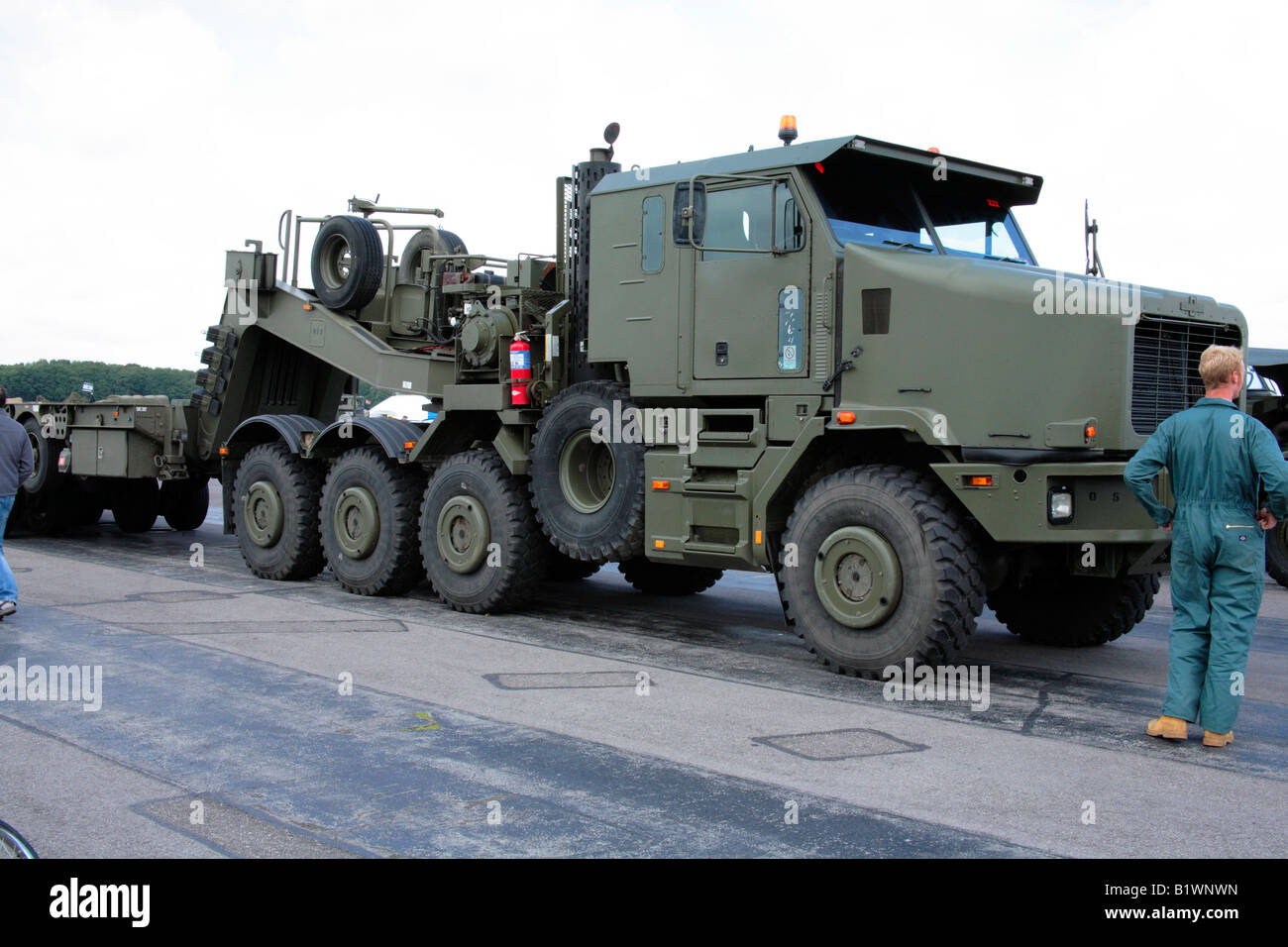Oshkosh HET and King tank trailer Stock Photo - Alamy