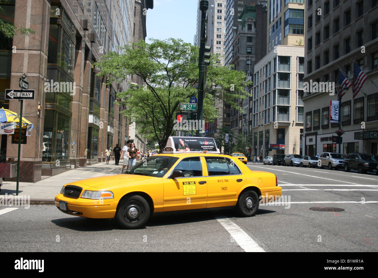 Yellow cab in new york city street Stock Photo - Alamy
