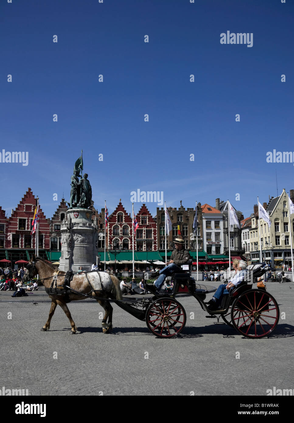 Sightseeing by horse-drawn carriage, Markt, Bruges, Flanders, Europe ...