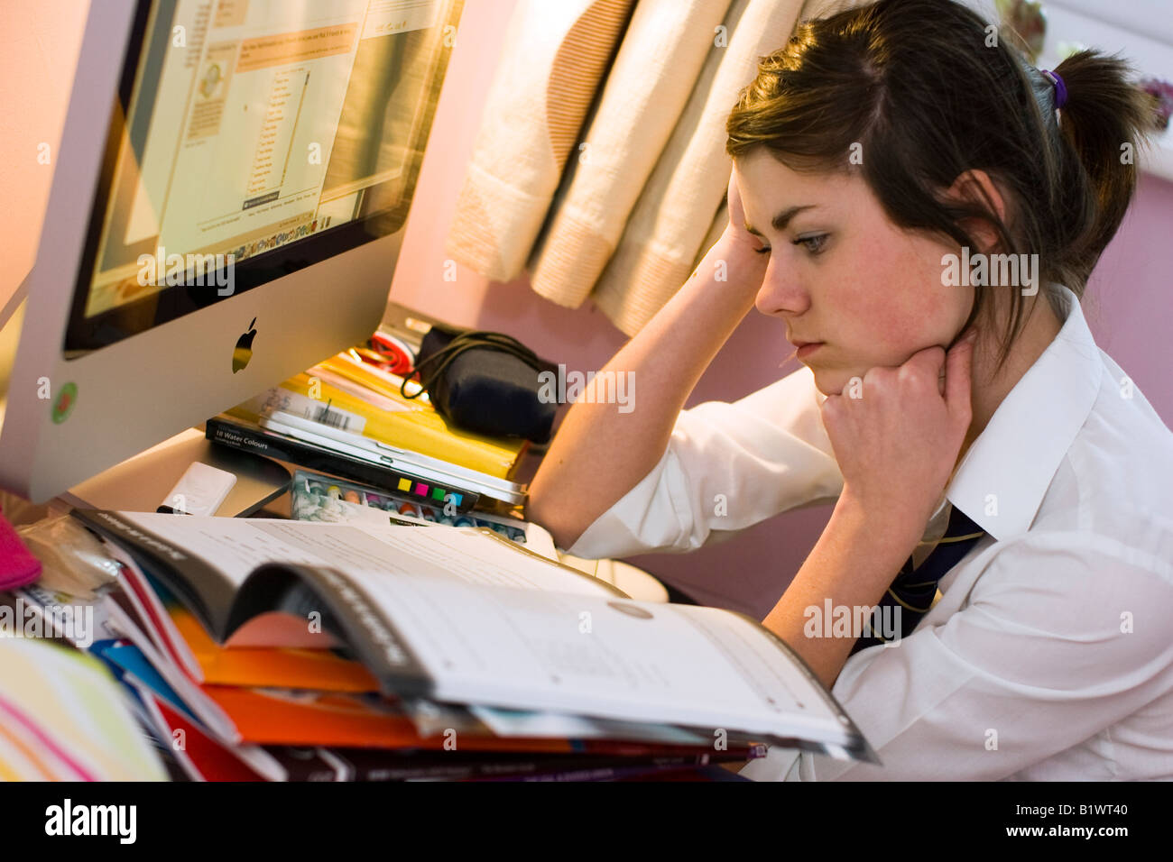 teenage girl at computer revising for her GCSEs Stock Photo - Alamy