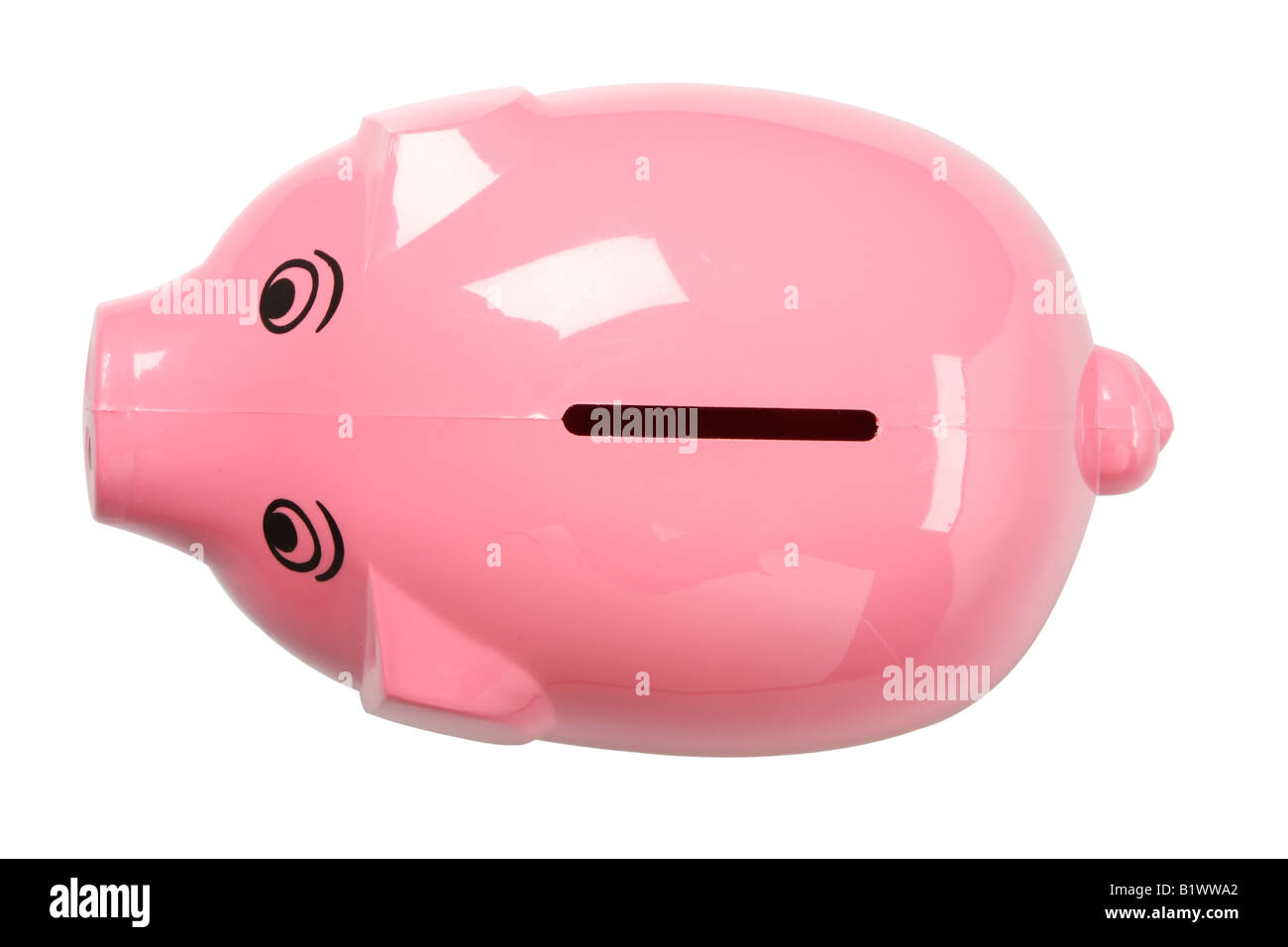 A pink piggy bank isolated on white shot from above clipping path ...