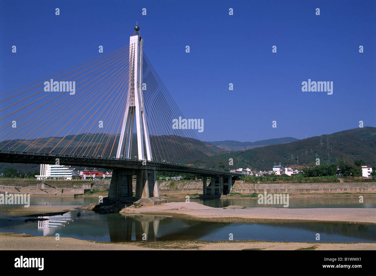 China, Yunnan, Xishuangbanna, Jinghong, bridge over Mekong river Stock ...