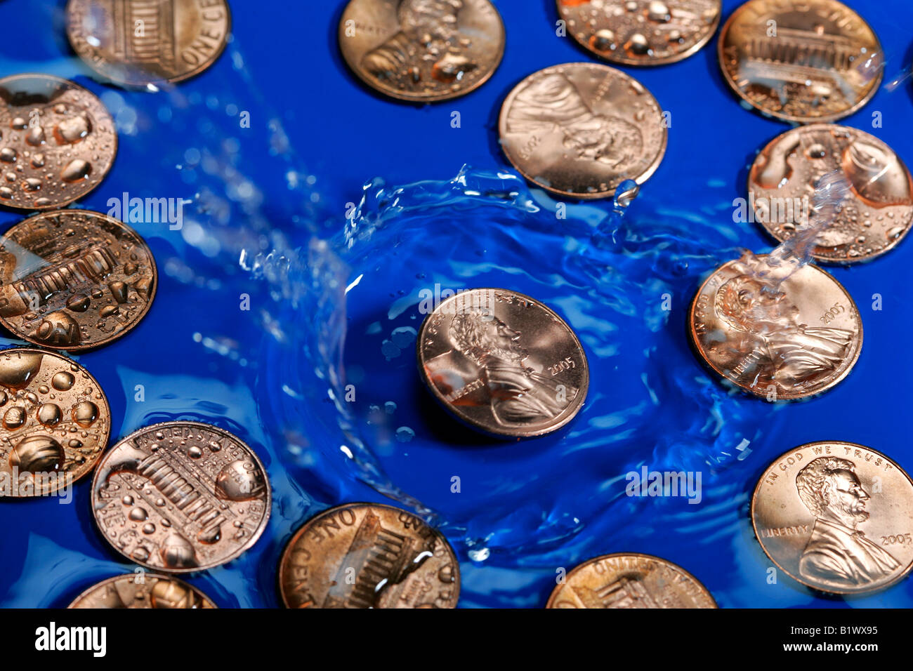 US 1 one cent water reflection abstract blue concept currency finance ...