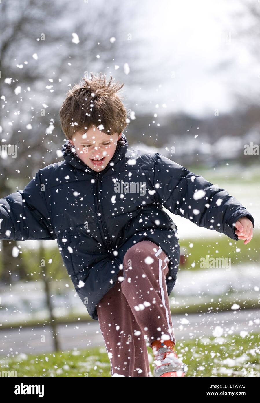 boy playing snow Stock Photo - Alamy