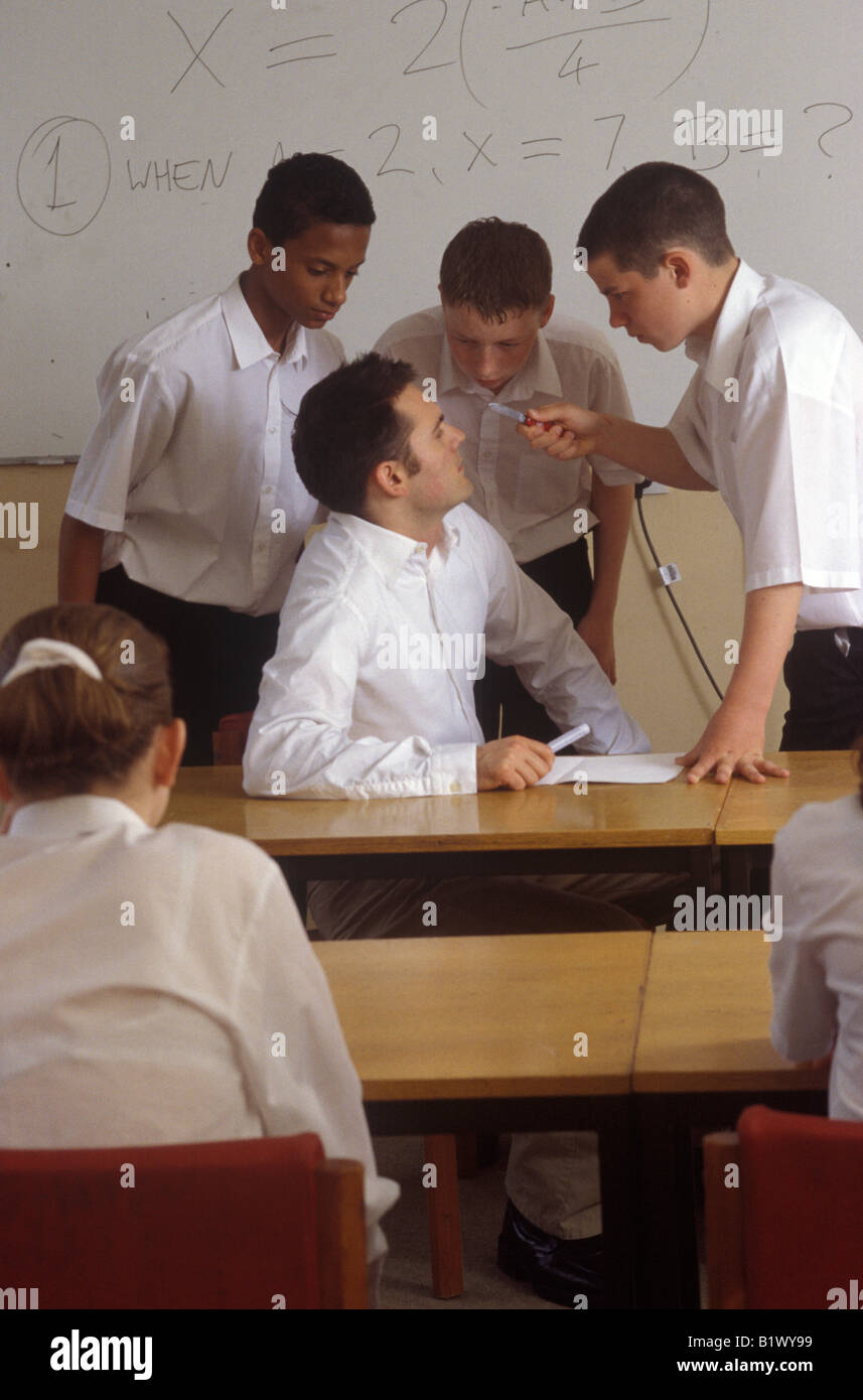 teenage boy with knife in class Stock Photo - Alamy