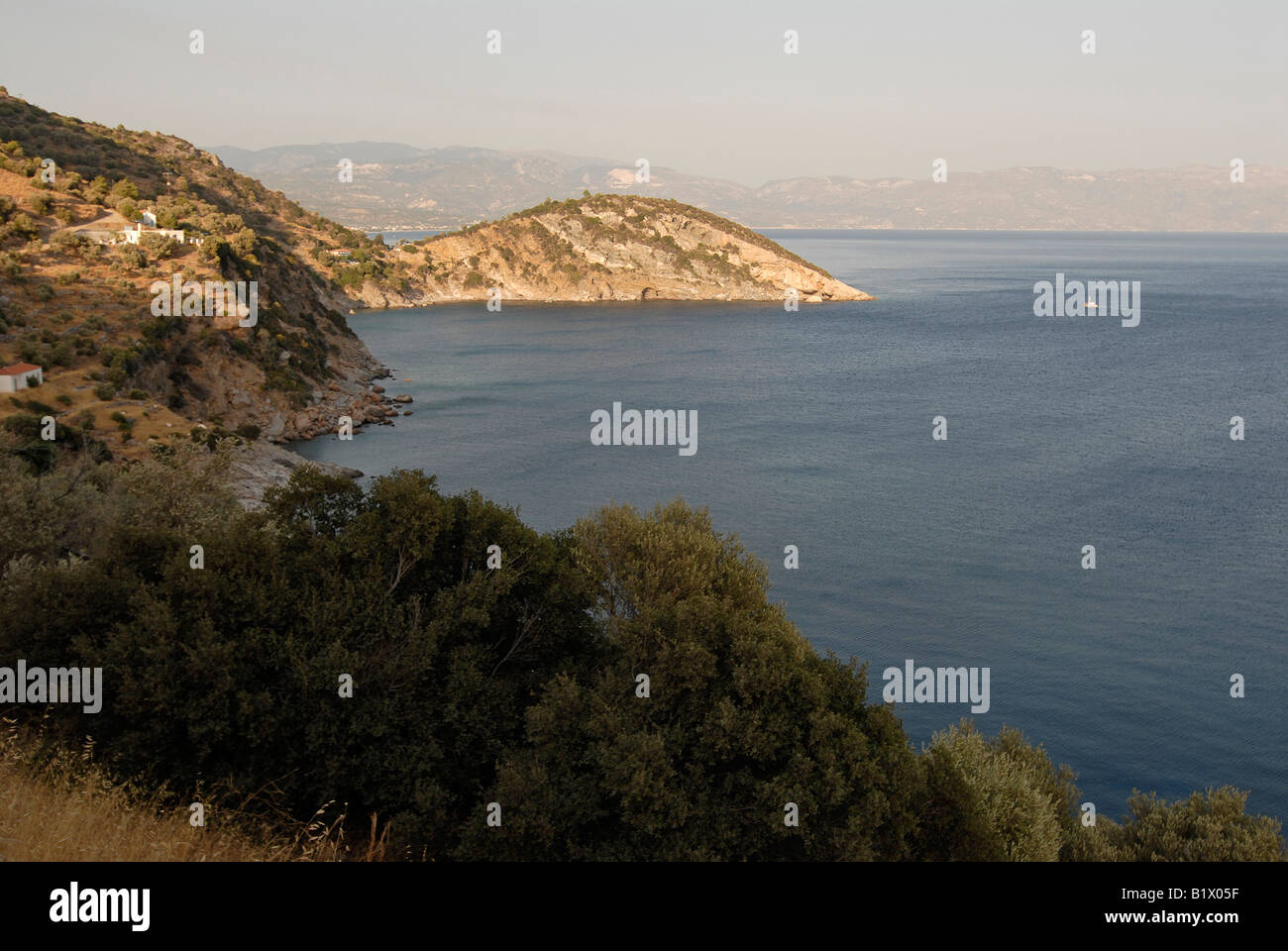Aerial view of a bay with cape Makriá Poúnda in the southwest of the ...