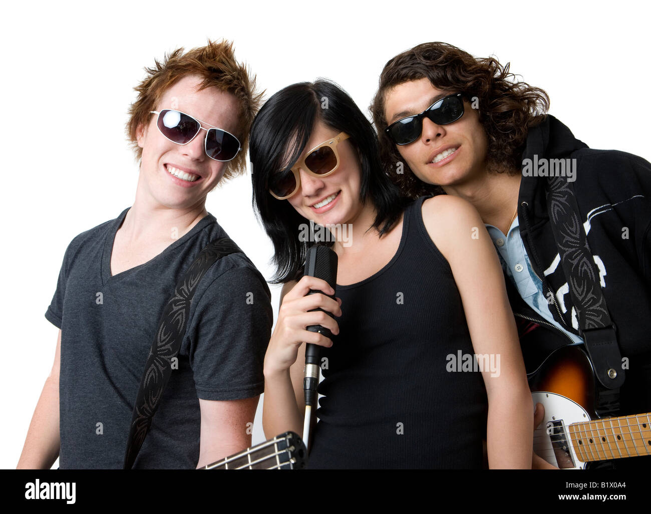Three bandmates with instruments in a studio Stock Photo - Alamy