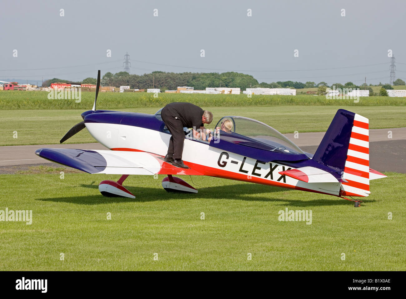 Vans RV-8 G-LEXX on the flight line with piot & passenger embarking at ...
