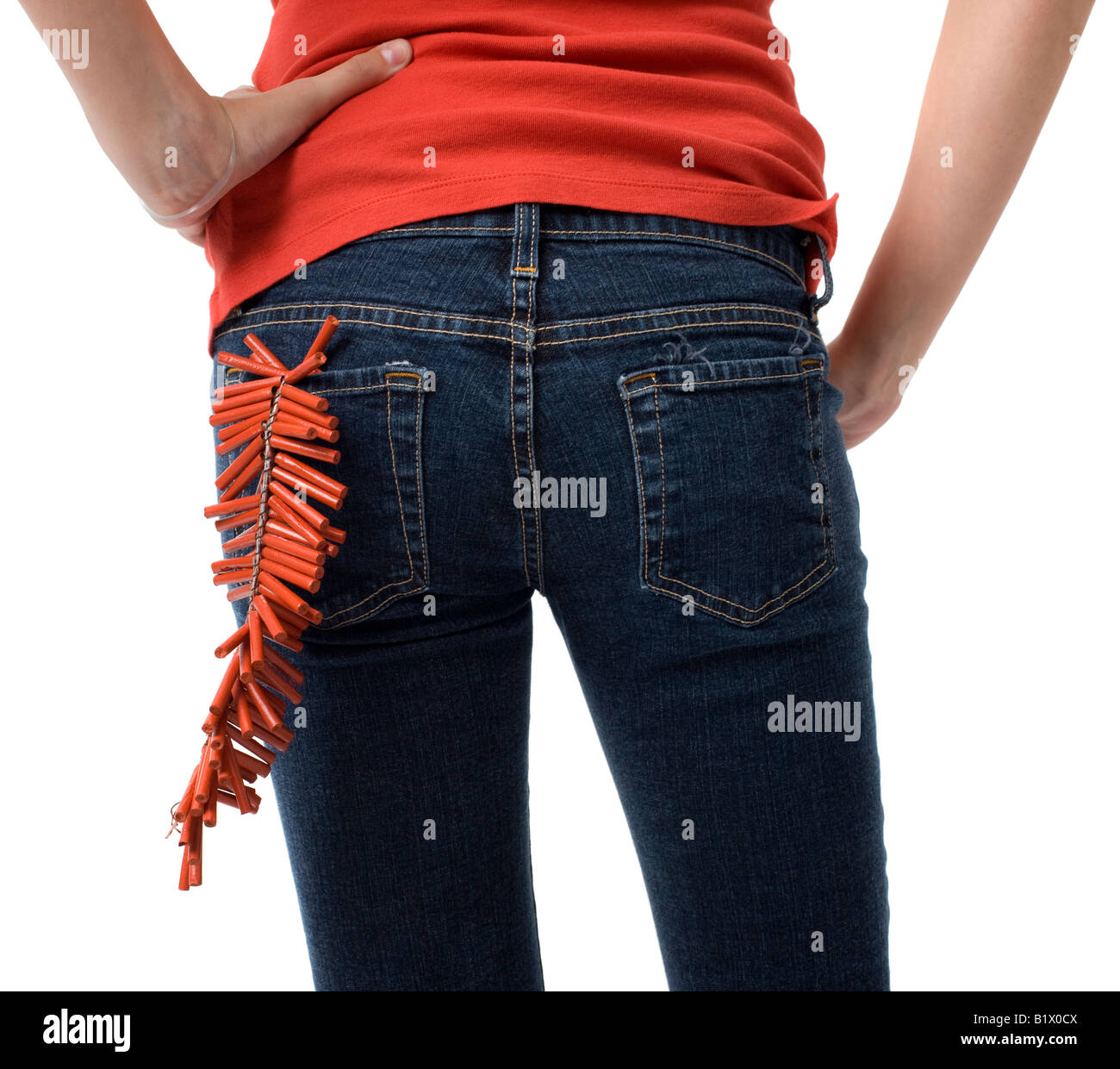 A girl with firecrackers in her back pocket Stock Photo - Alamy