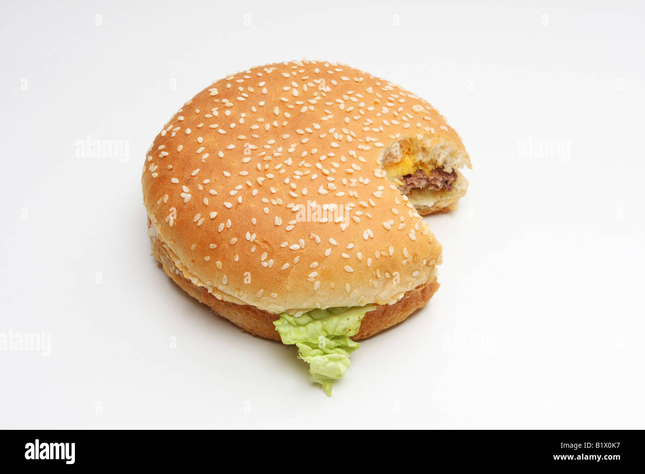 Hamburger isolated on white one bite taken out of it Stock Photo - Alamy