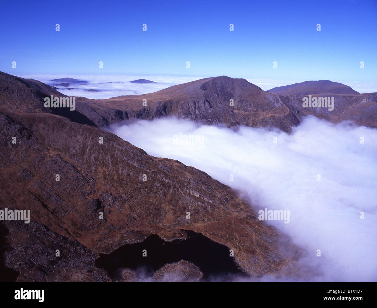Aerial view of Y Garn and Ogwen Valley above cloud inversion Snowdonia ...