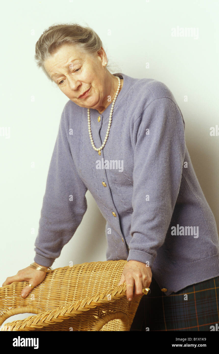 elderly woman feeling dizzy Stock Photo - Alamy