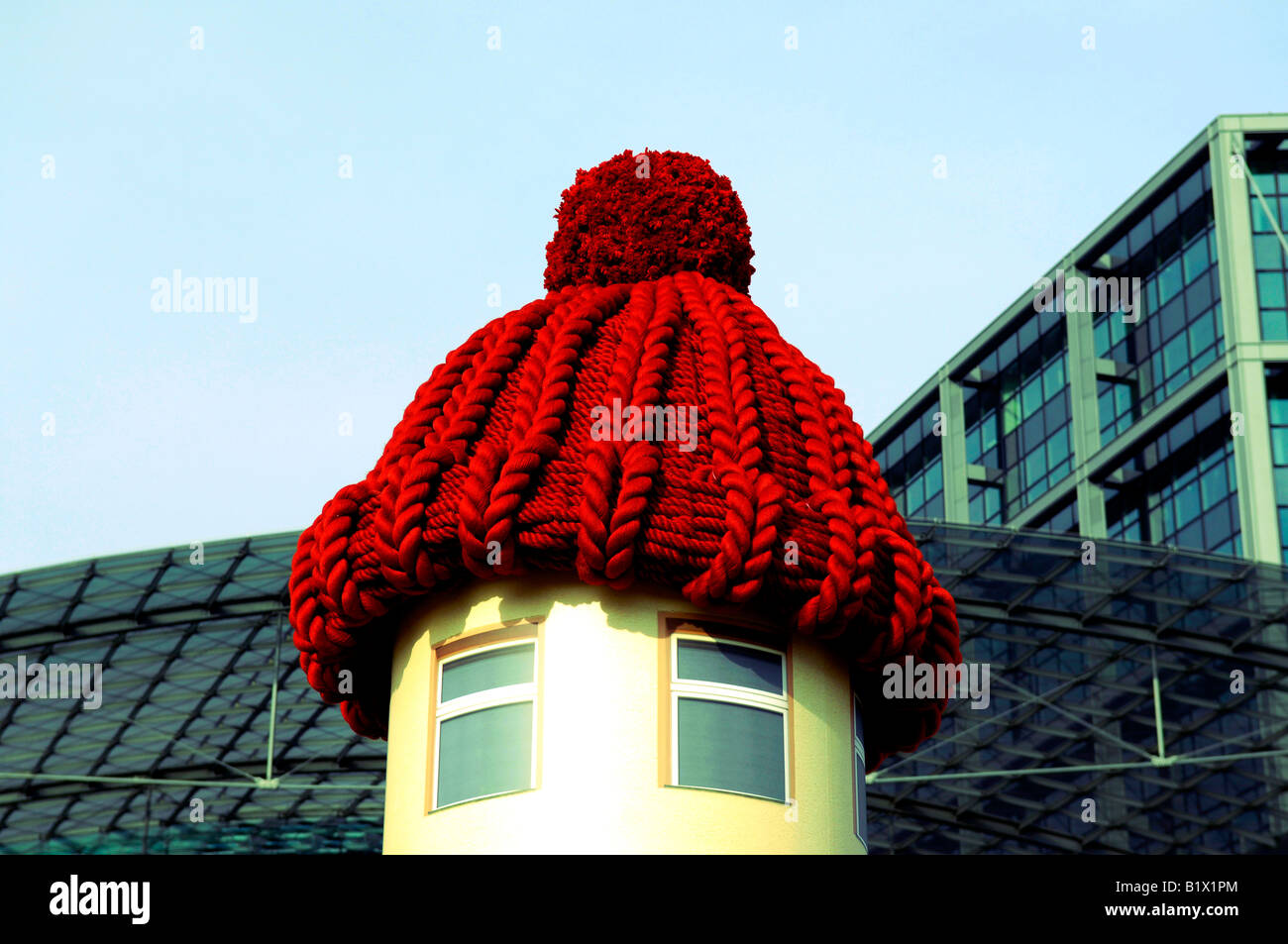 oversized red bobble hat Berlin Stock Photo - Alamy