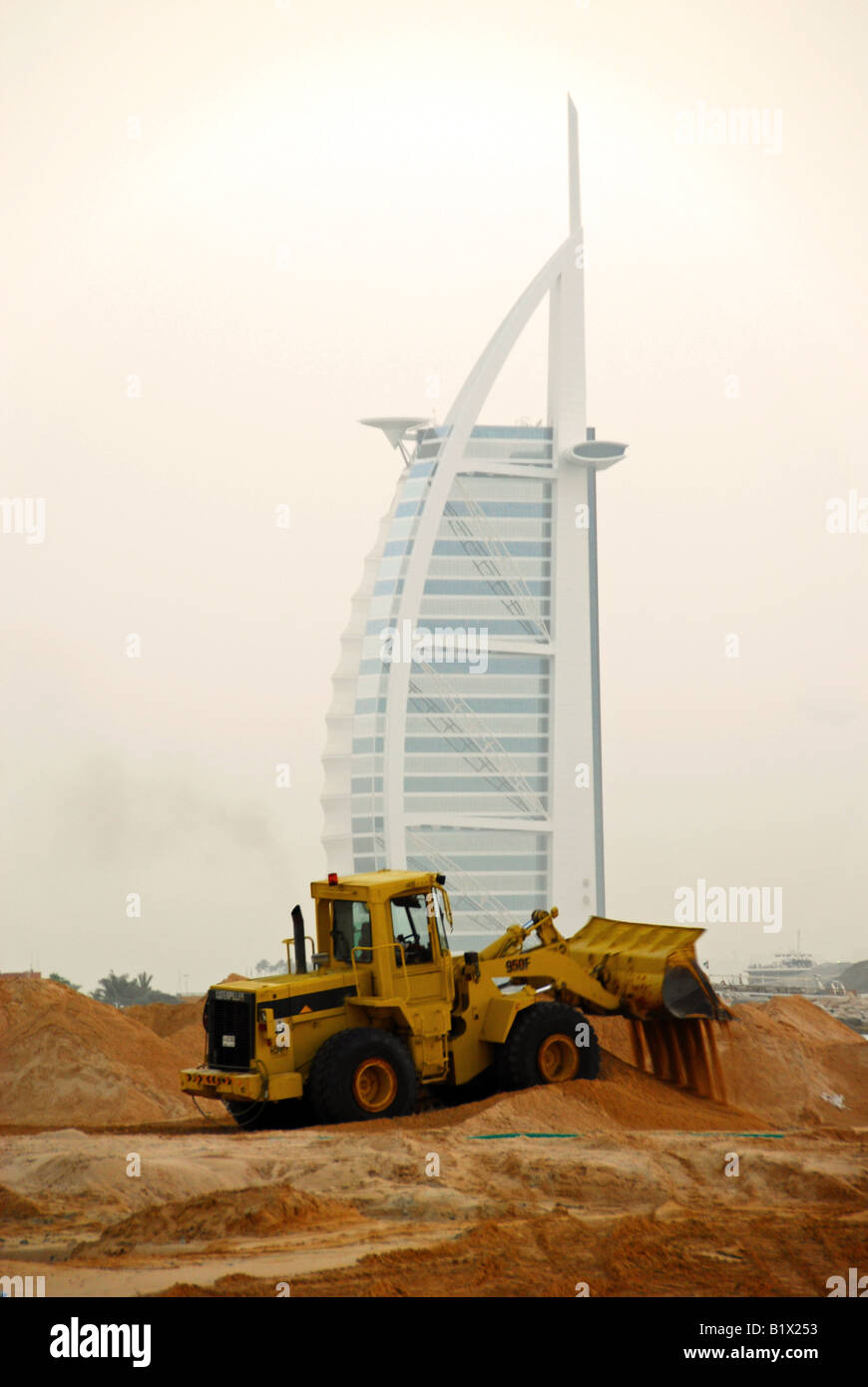 Building works on Jumeirah Beach, Dubai with Burj Al Arab hotel in ...