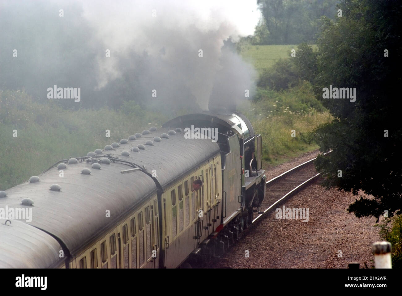 Steam engine Foremarke Hall pulling passnger train in Cotswolds ...