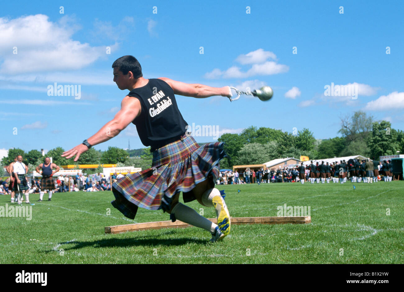 Throwing the Weight event at a Scottish Highland Games event Stock ...