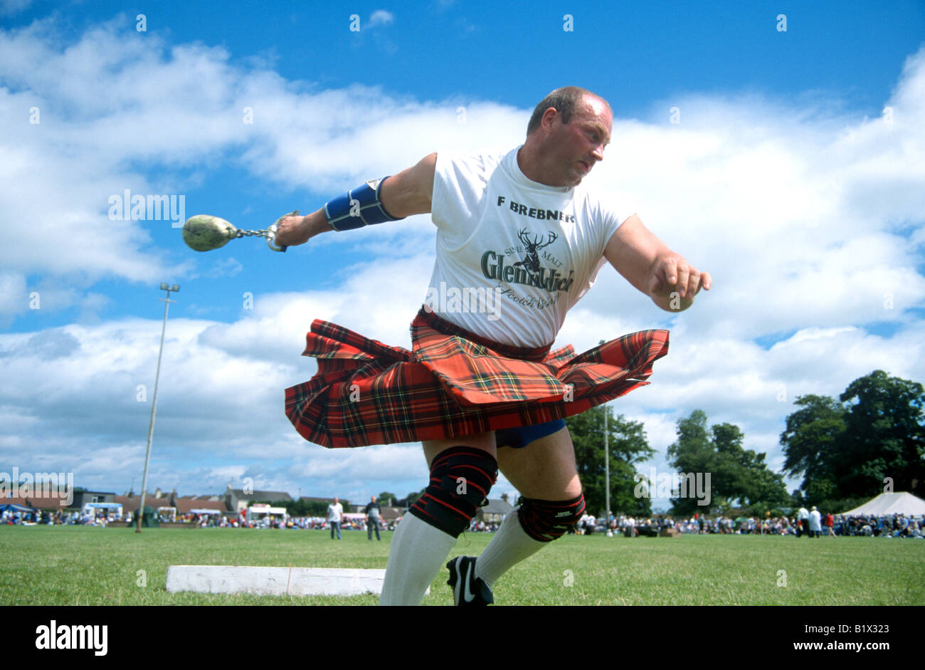 Throwing the Weight event at a Scottish Highland Games event Stock ...