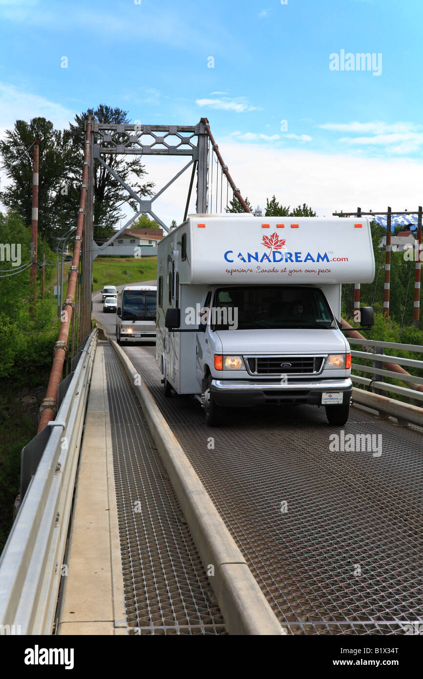 RV camper crossing the Hagwilget bridge over Bulkley river Hazelton BC ...